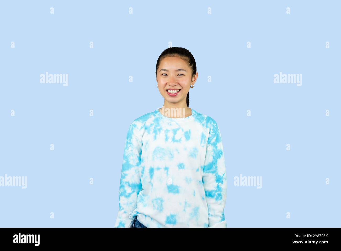 Young Asian Girl in blue dress disgust happy expression and face ...