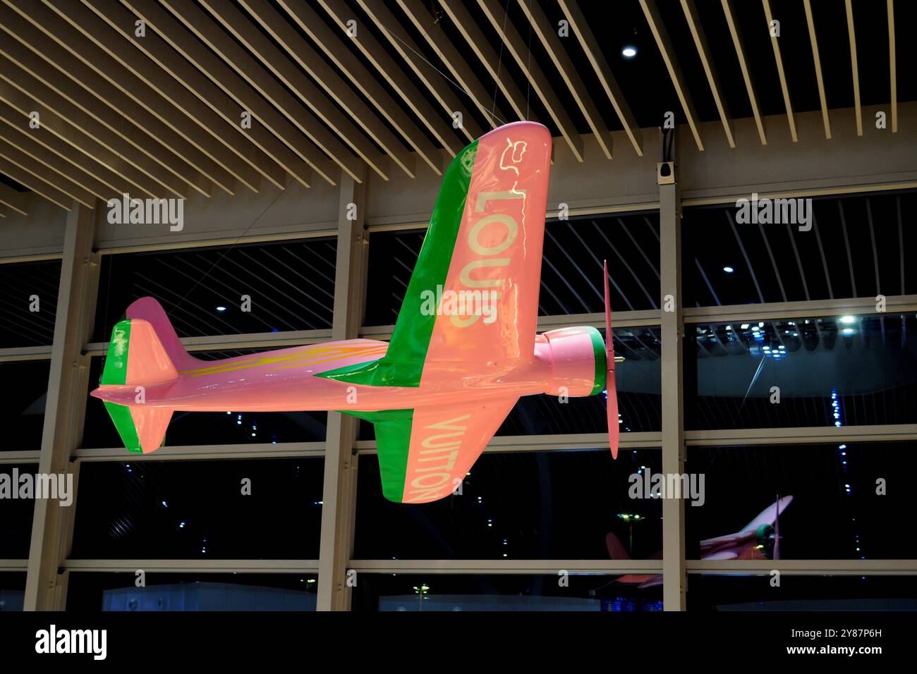 Model aeroplane suspended over the Louis Vuitton store in Terminal 3 of ...