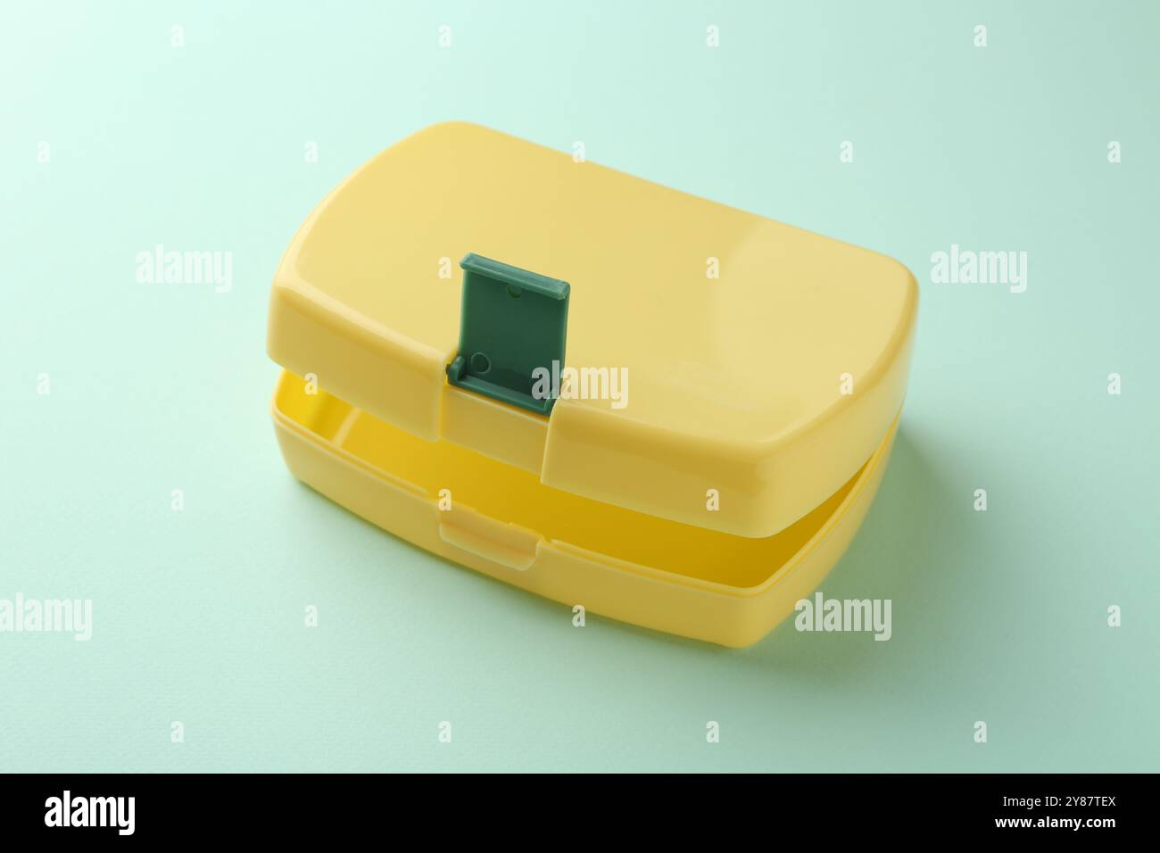 One empty lunch box on light blue background Stock Photo - Alamy