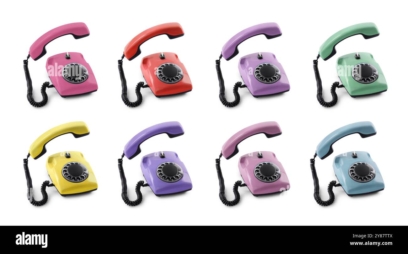 Old telephone with rotary dial of different colors isolated on white ...