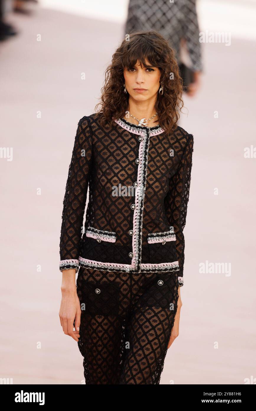 A model wears a creation as part of the Chanel Spring/Summer 2025 ...