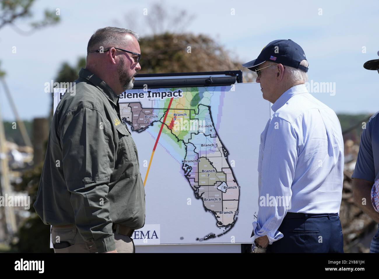 President Joe Biden receives an operational briefing from Director John ...