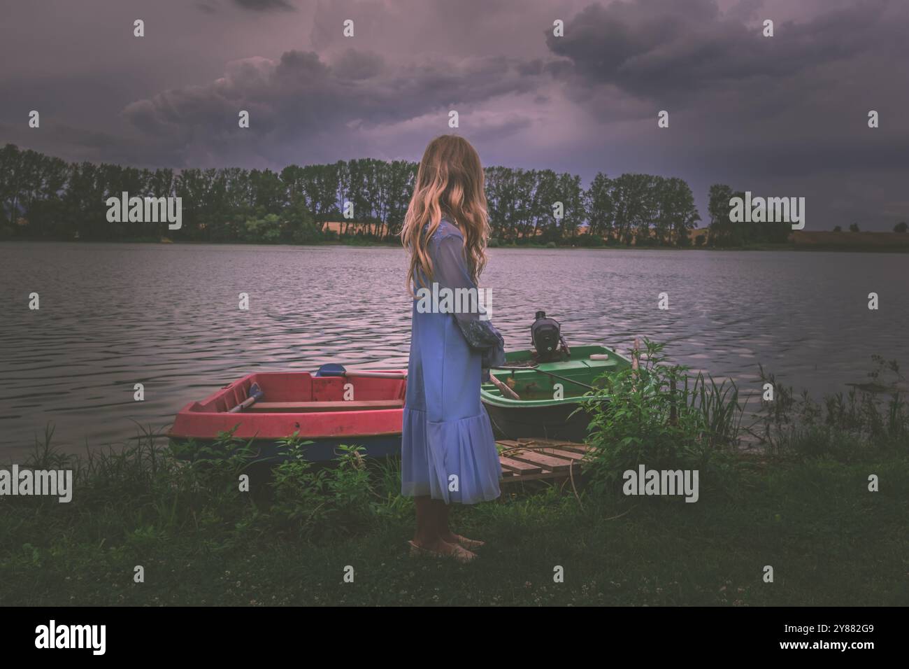 beautiful adorable divine girl in blue dress in green meadow by the ...