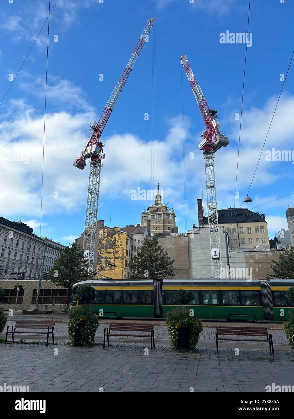 Construction work with two tower cranes in Helsinki, Finland Stock ...