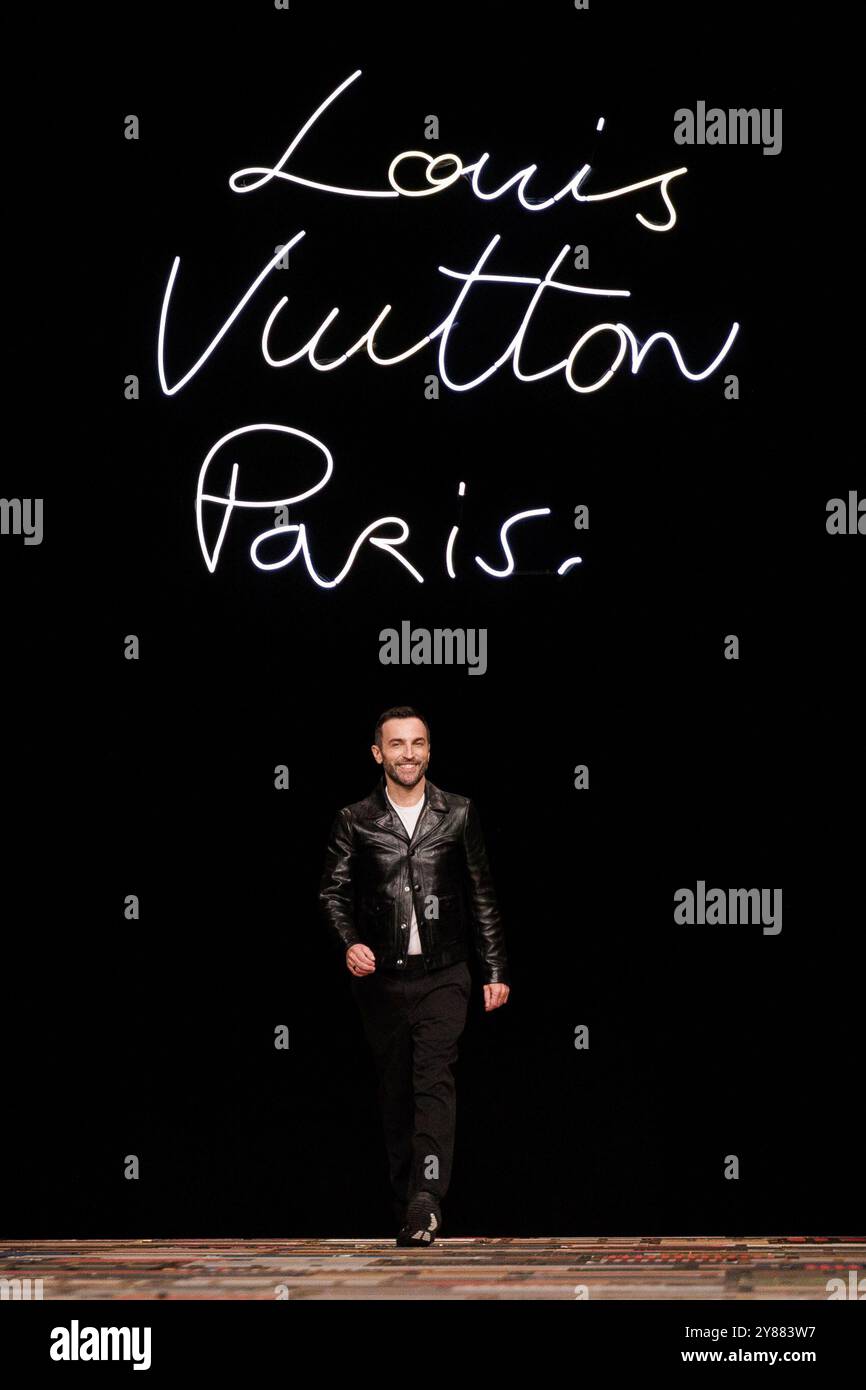 Designer Nicolas Ghesquiere accepts applause after the Louis Vuitton ...