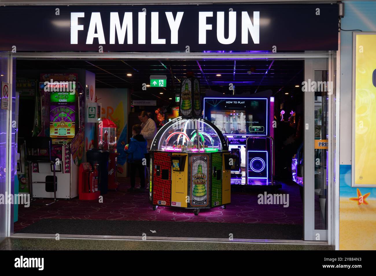 Amusement arcade with large family fun sign. Dawlish Devon England ...