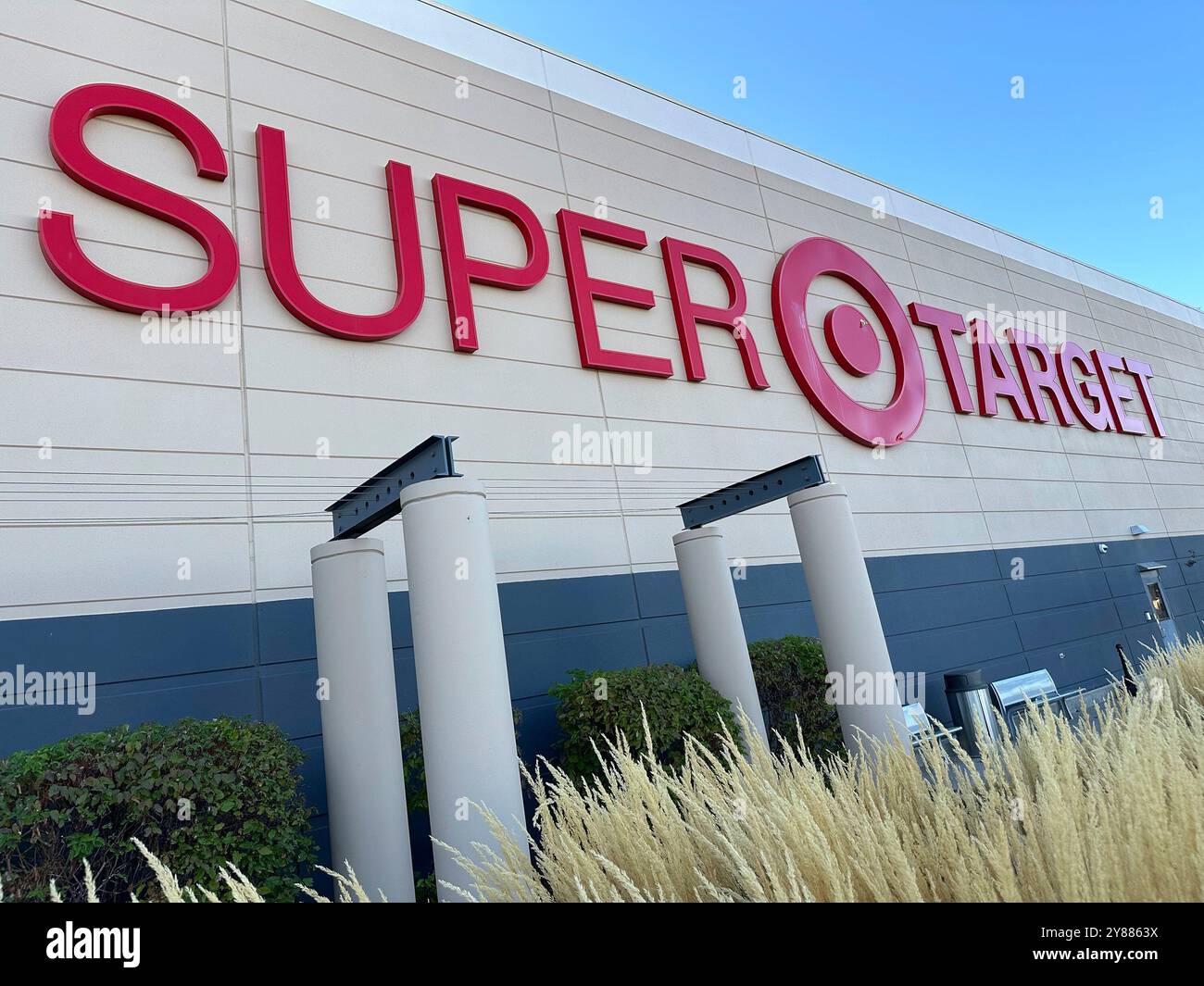 The sign is shown on the exterior of a Super Target store Wednesday ...