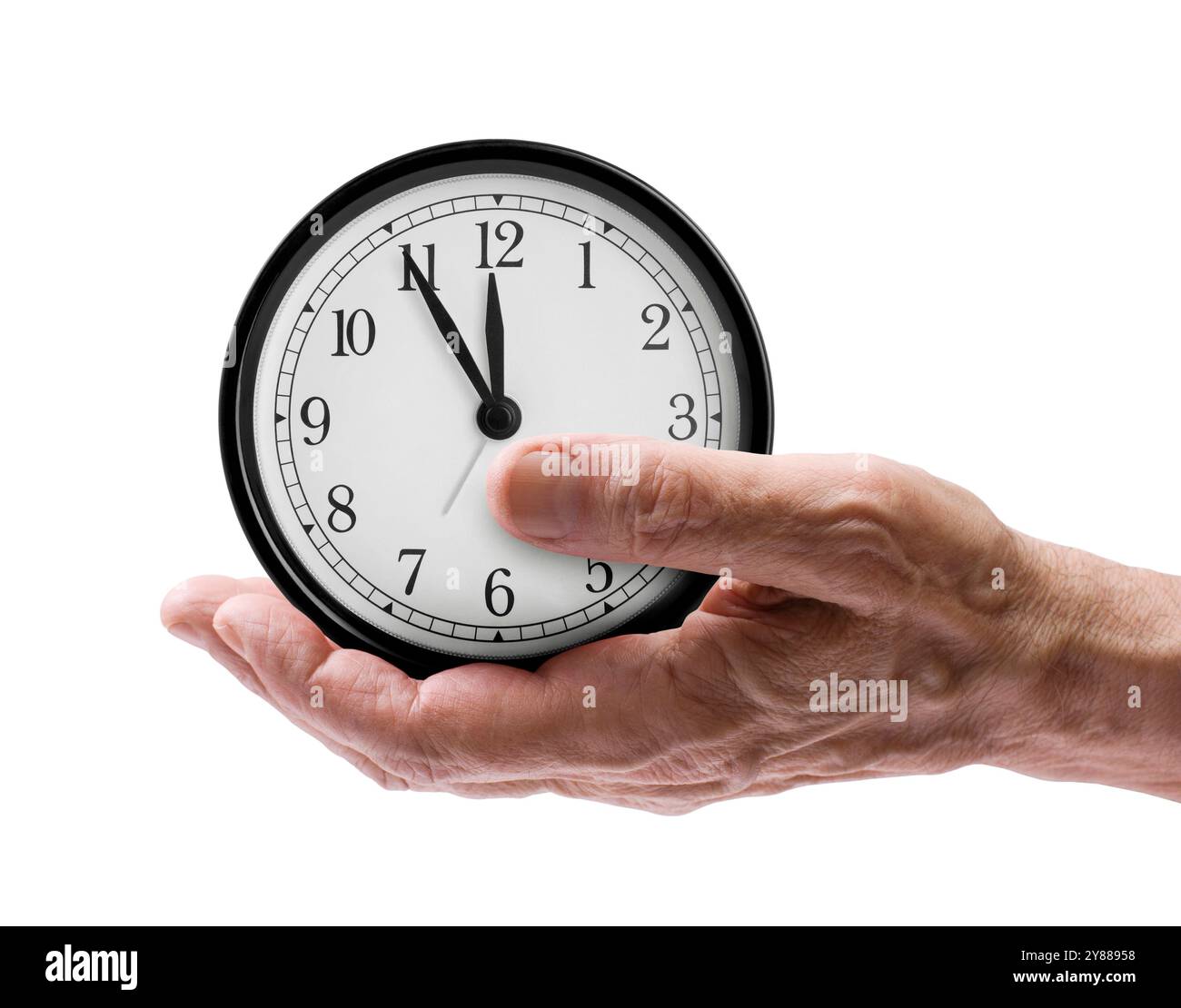 Classic round clock on senior hand isolated on white background. Aging ...