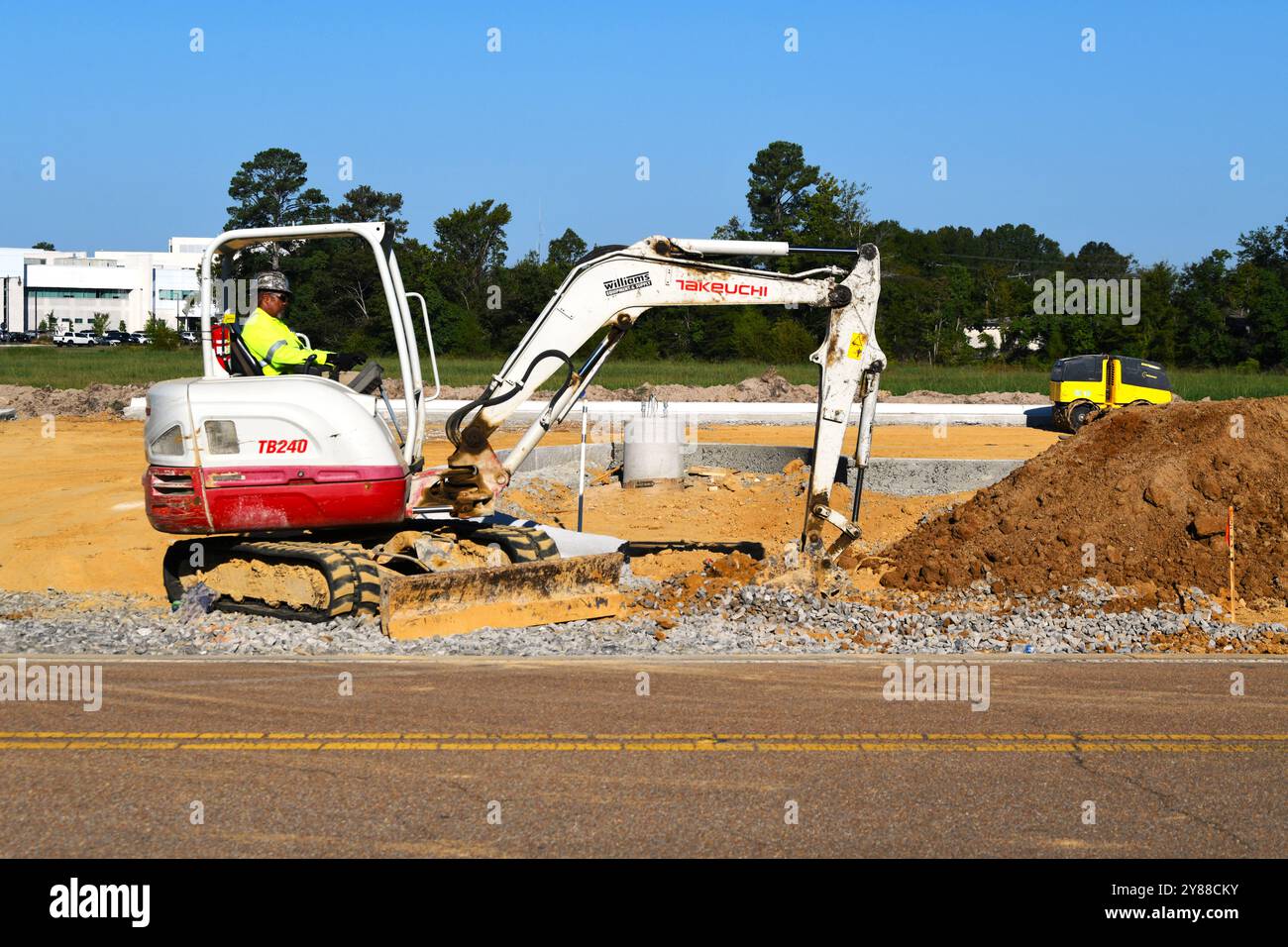 Takeuchi TB 240 mini excavator Stock Photo - Alamy