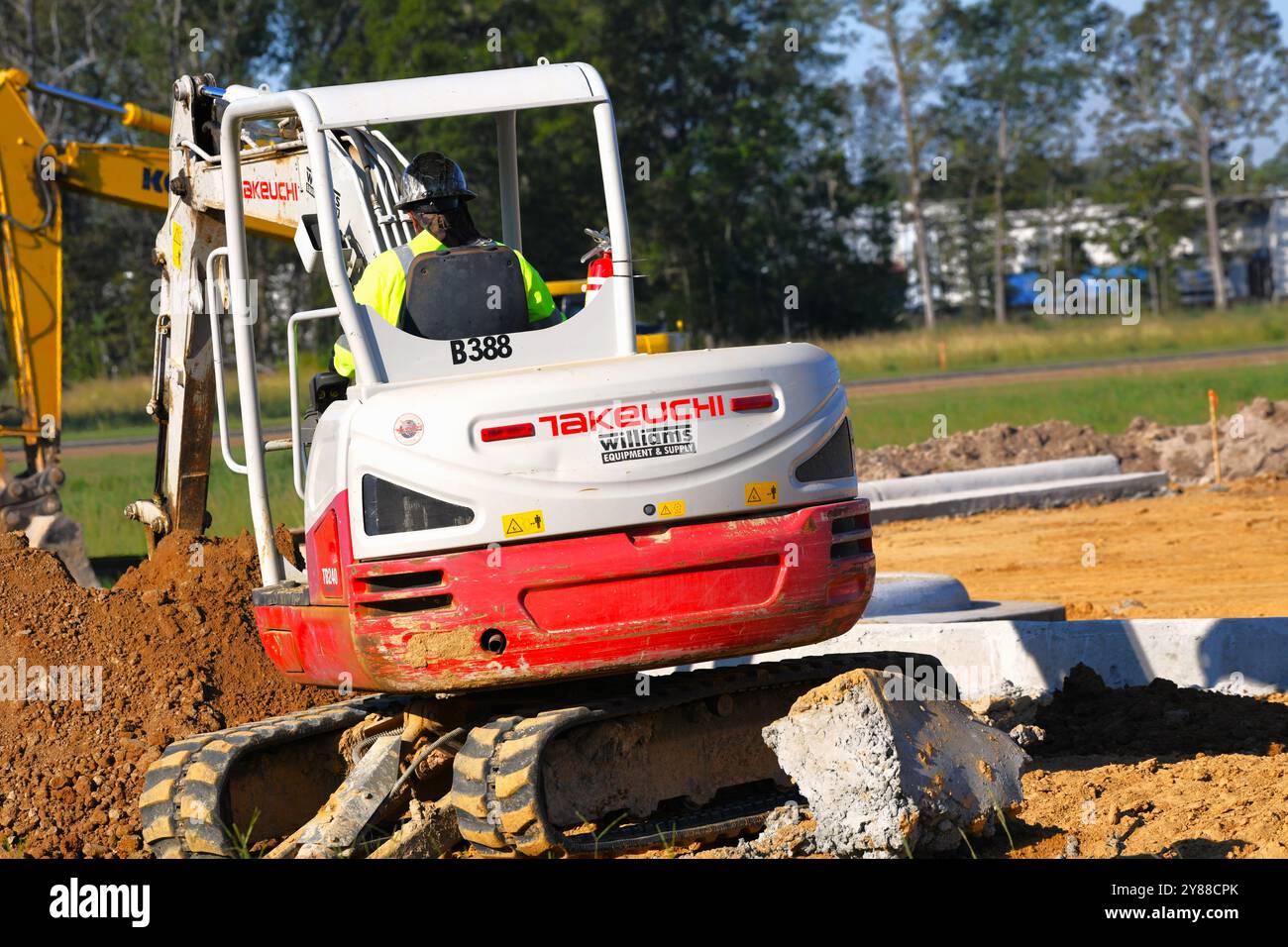Takeuchi TB 240 mini excavator Stock Photo - Alamy