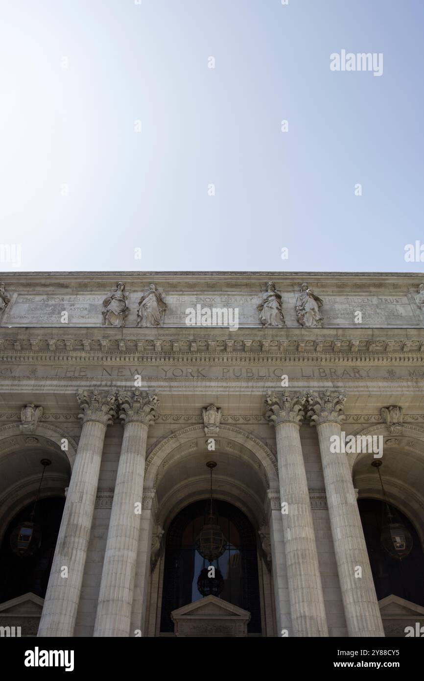 Striking façade of the New York Public Library, featuring towering ...