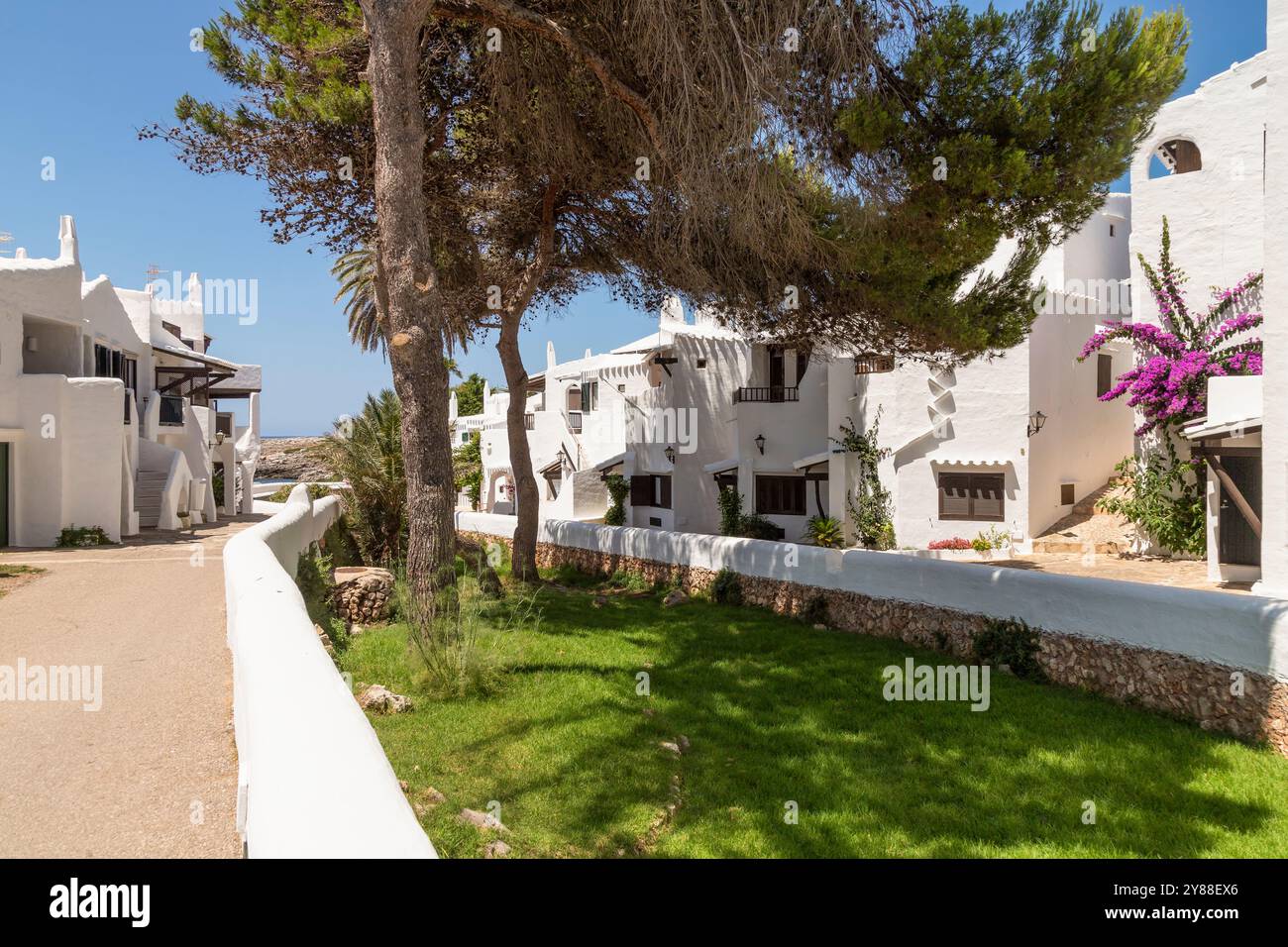 White houses in the picturesque coastal village of Binibequer on the ...