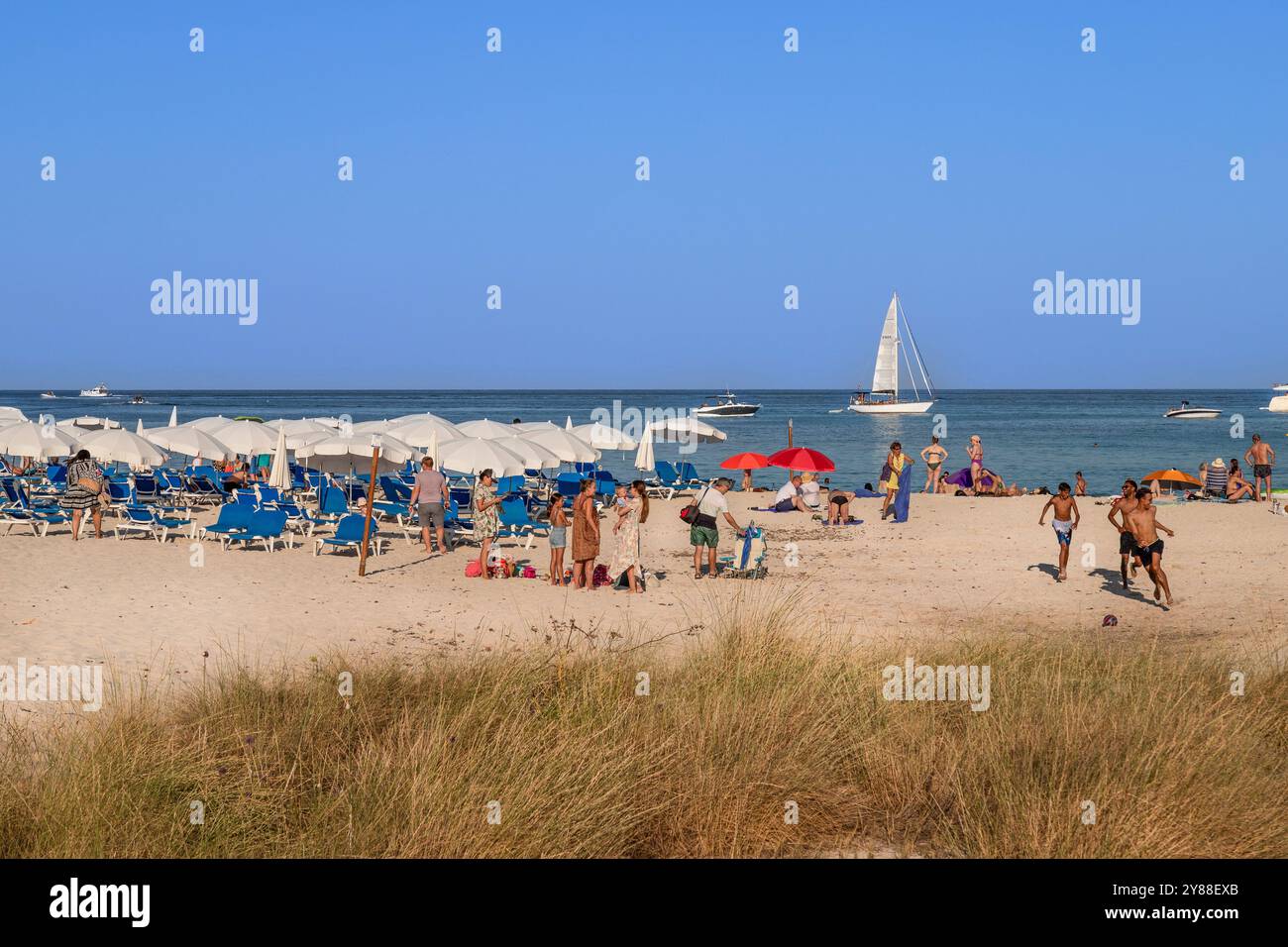 Beach at the quiet seaside resort of Punta Prima in the far southeast of Menorca Stock Photo - Alamy