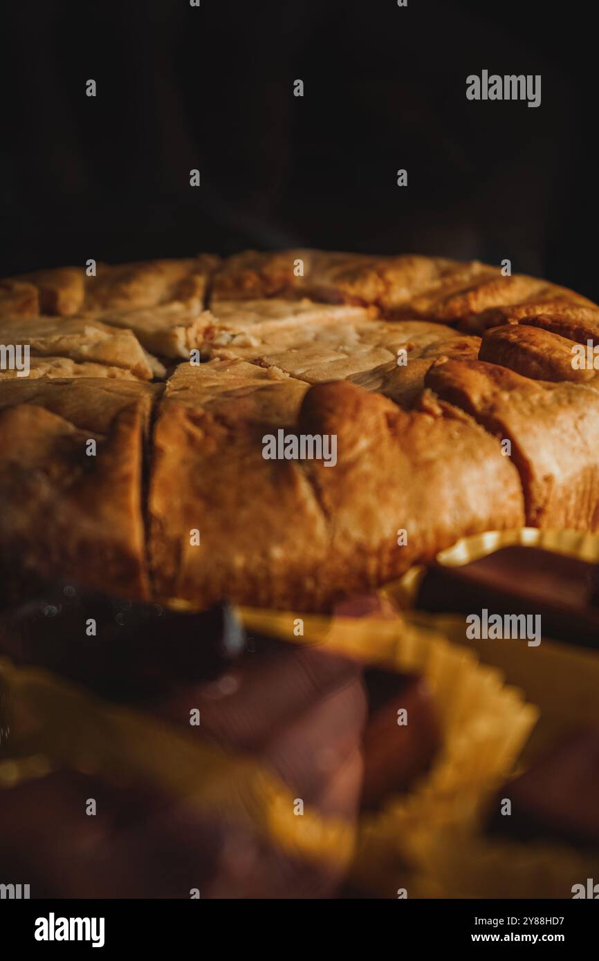 Chicken pie front view close up. Display case with a variety of cakes ...
