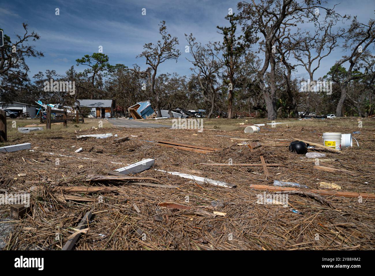 Wrack from the storm surge can be seen throughout the small town of ...