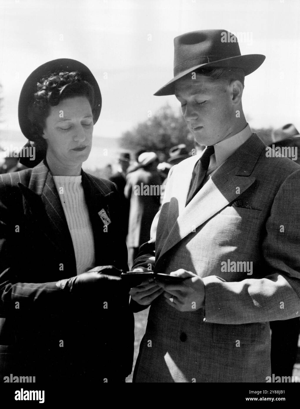 Mrs F M Bailey with her son John a police cadet. inspecting the George ...