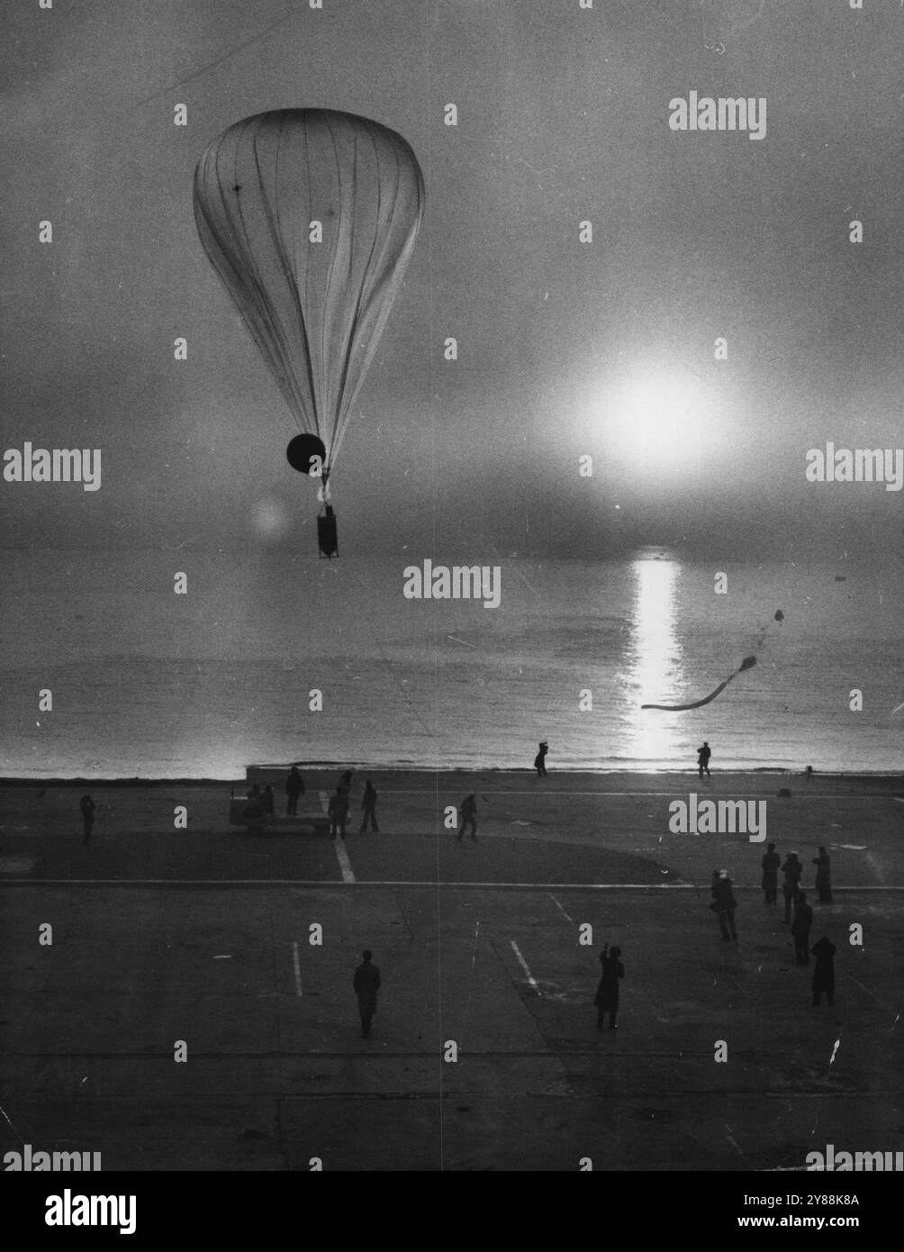 A giant weather balloon being released form a U.S. base. It is equipped ...