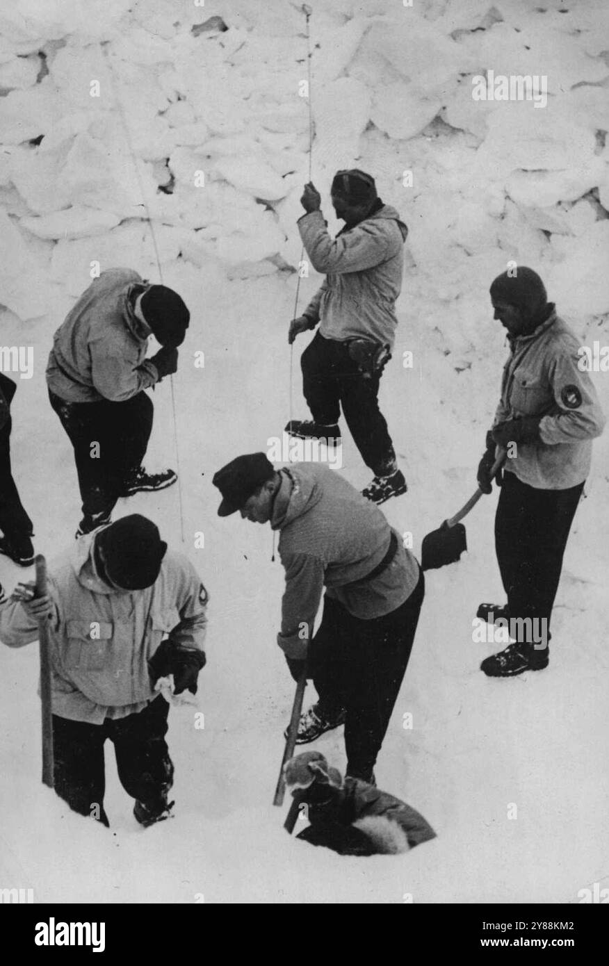 Search Goes On For Avalanche Victims -- Frontier police digging a shaft ...