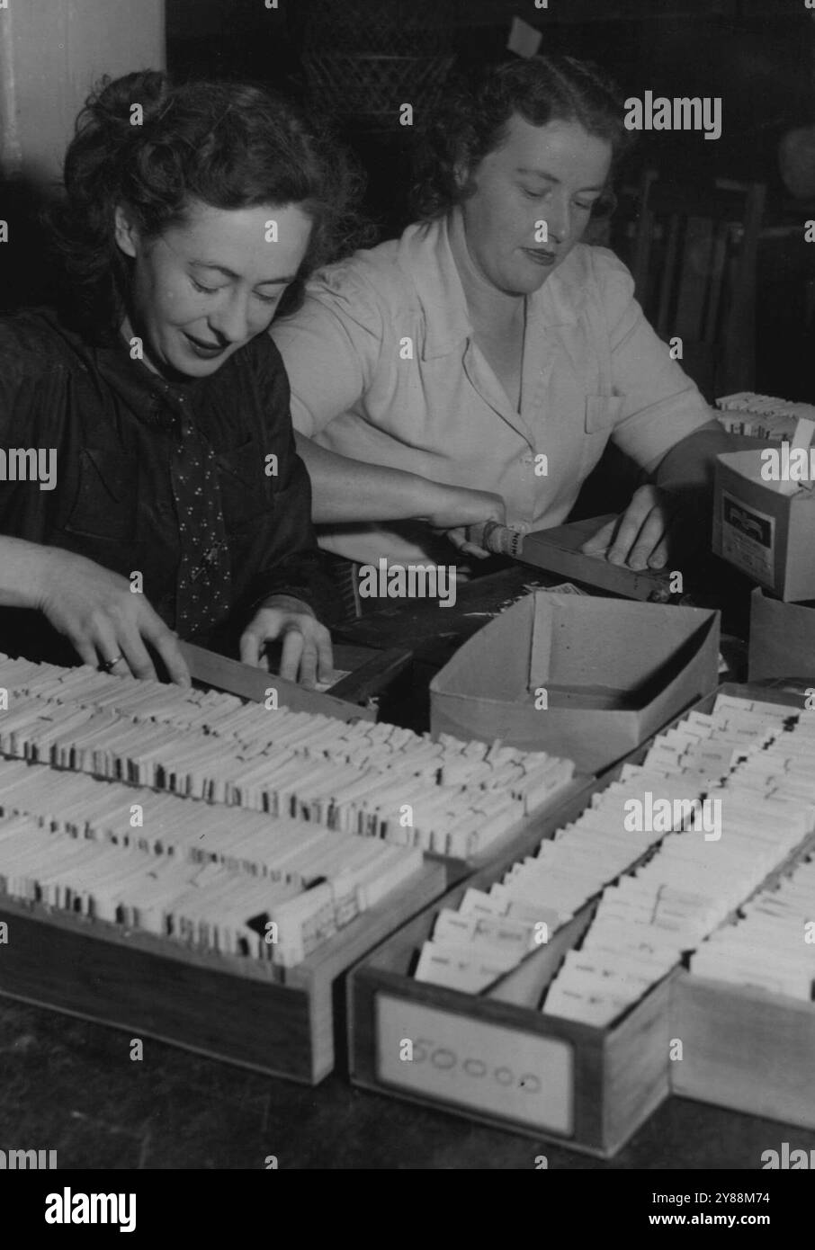 War Veterans' Art Union. Miss M. Massie and Miss A. Larkin guillotining ...