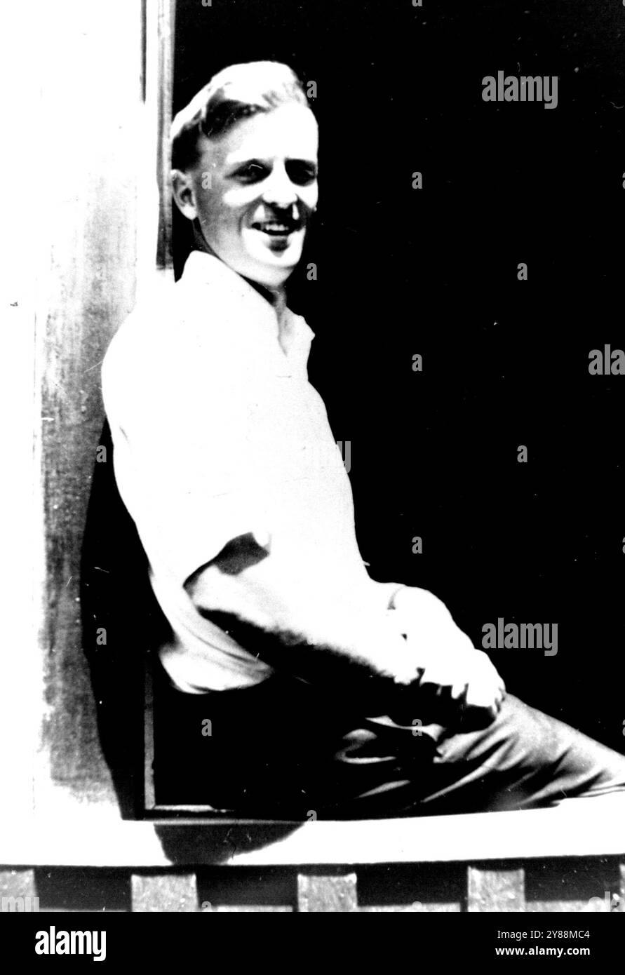 Joh "Snapped" in window of Sun room Kington beach-Hobart. Feb 1939. Joh ...