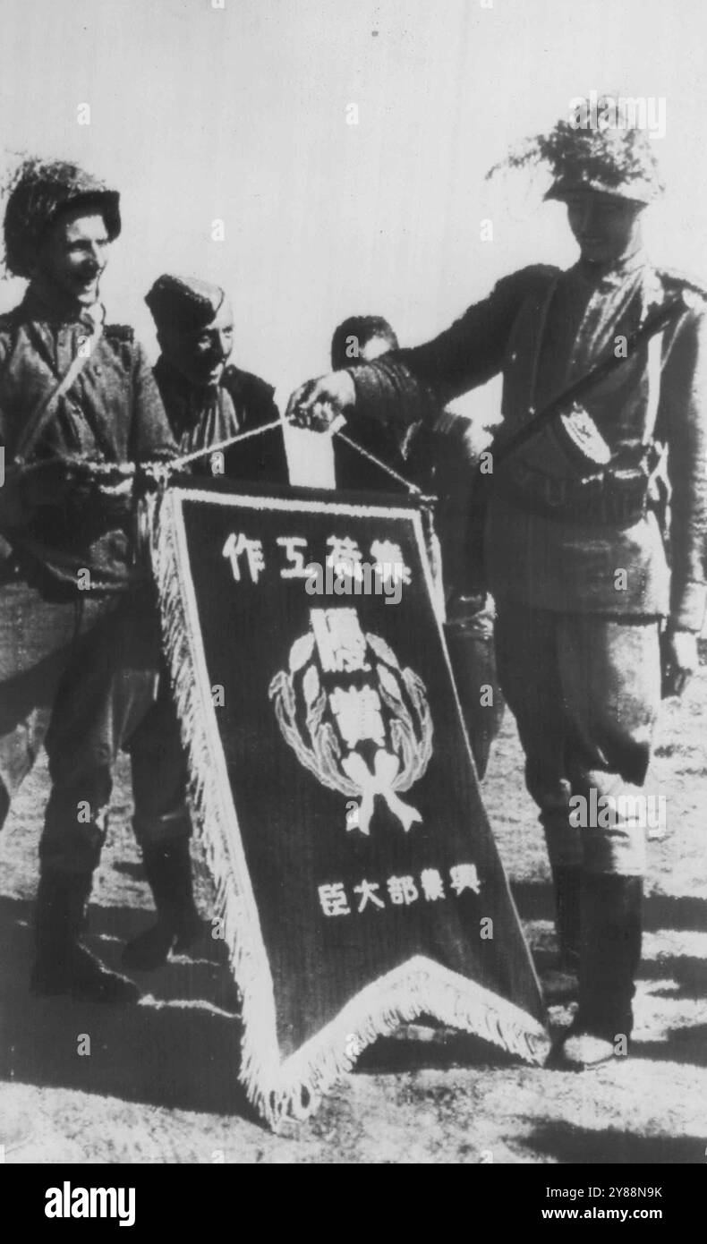 Russian Soldiers Examine Captured Jap. Banner In Manchuria -- Russian ...