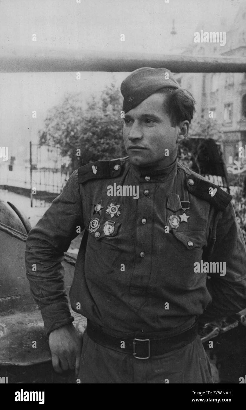 Berlin. Hero of the Soviet Union Sergeant Major Mikhail Korotov, a tank ...