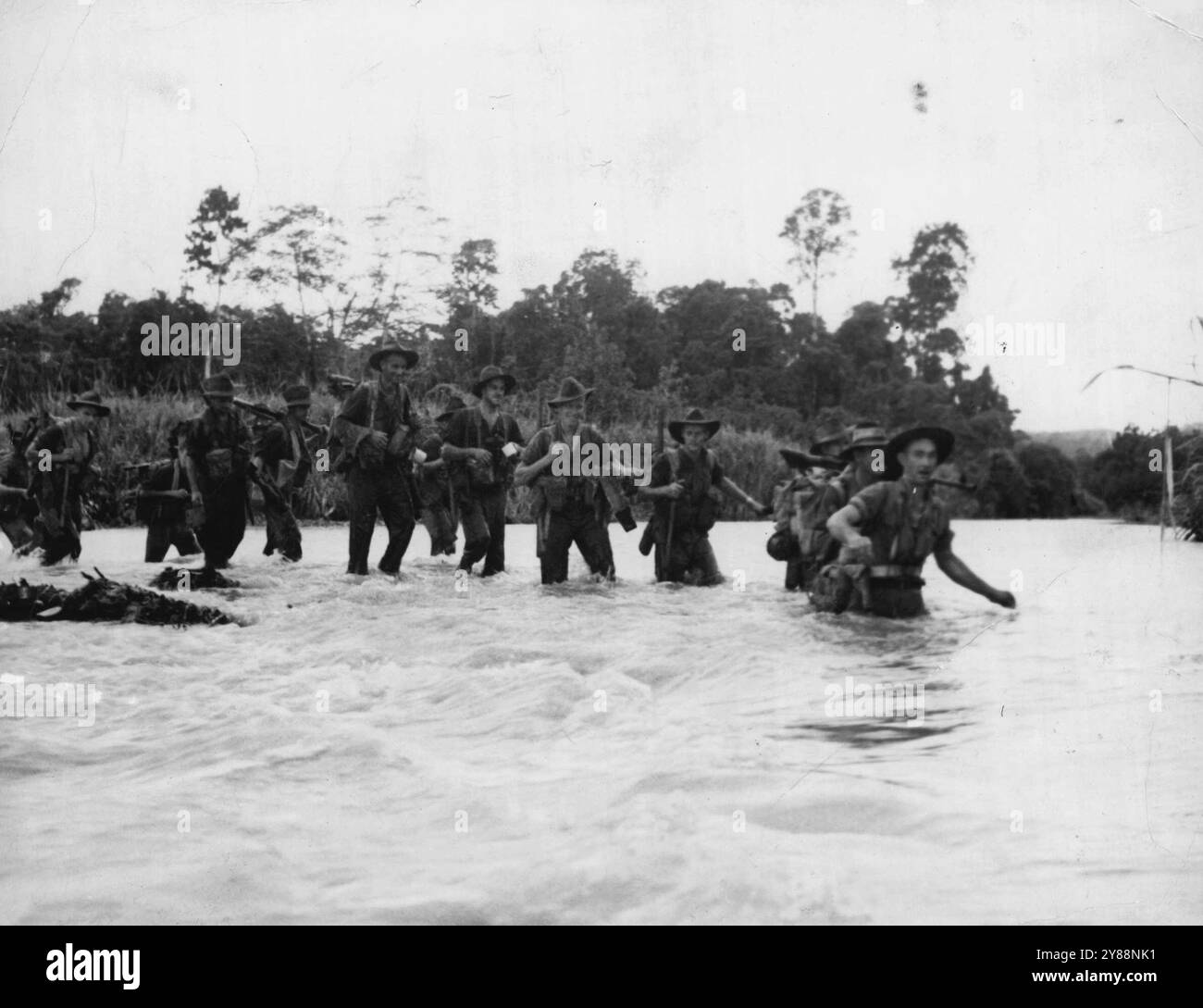 Fast flowing stream did not deter these Australian soldiers in pursuit ...