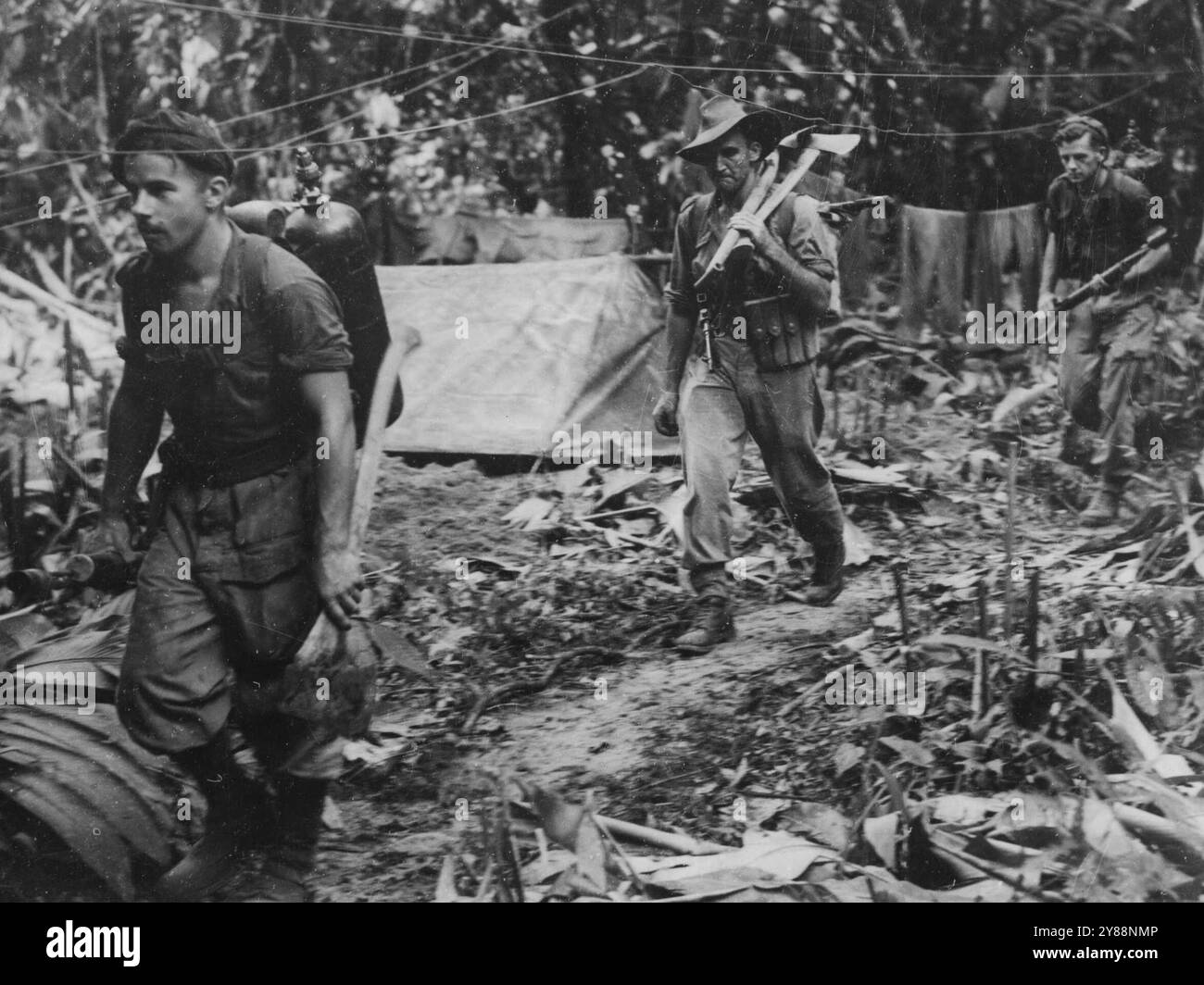 Infantry of the 3rd Australian Division carrying portable flame ...