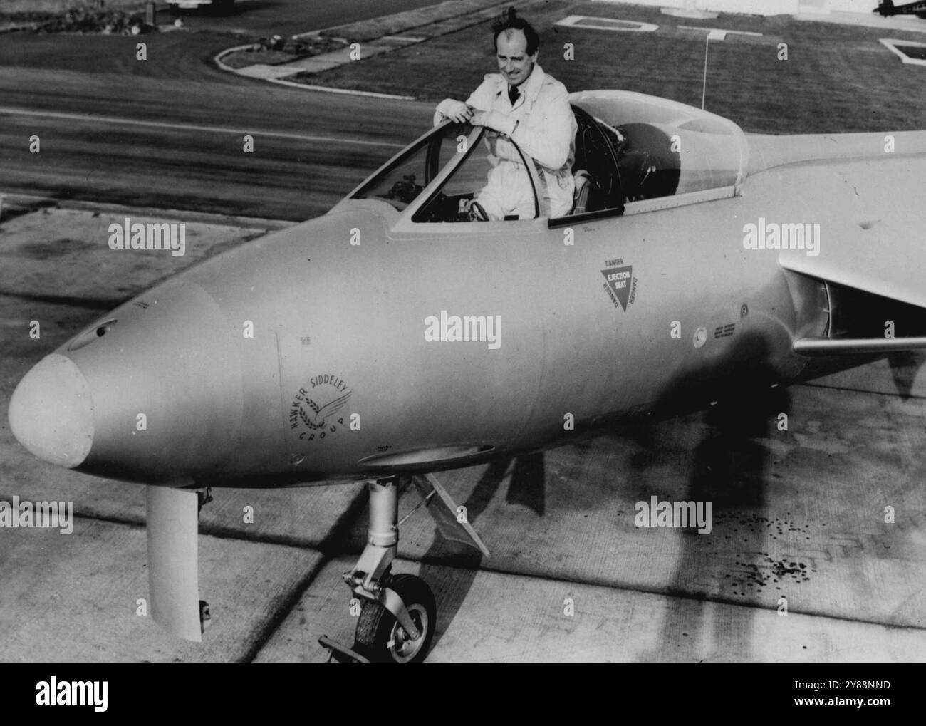 Hawker chief test pilot Neville Duke in the cockpit of the sleek Hawker ...