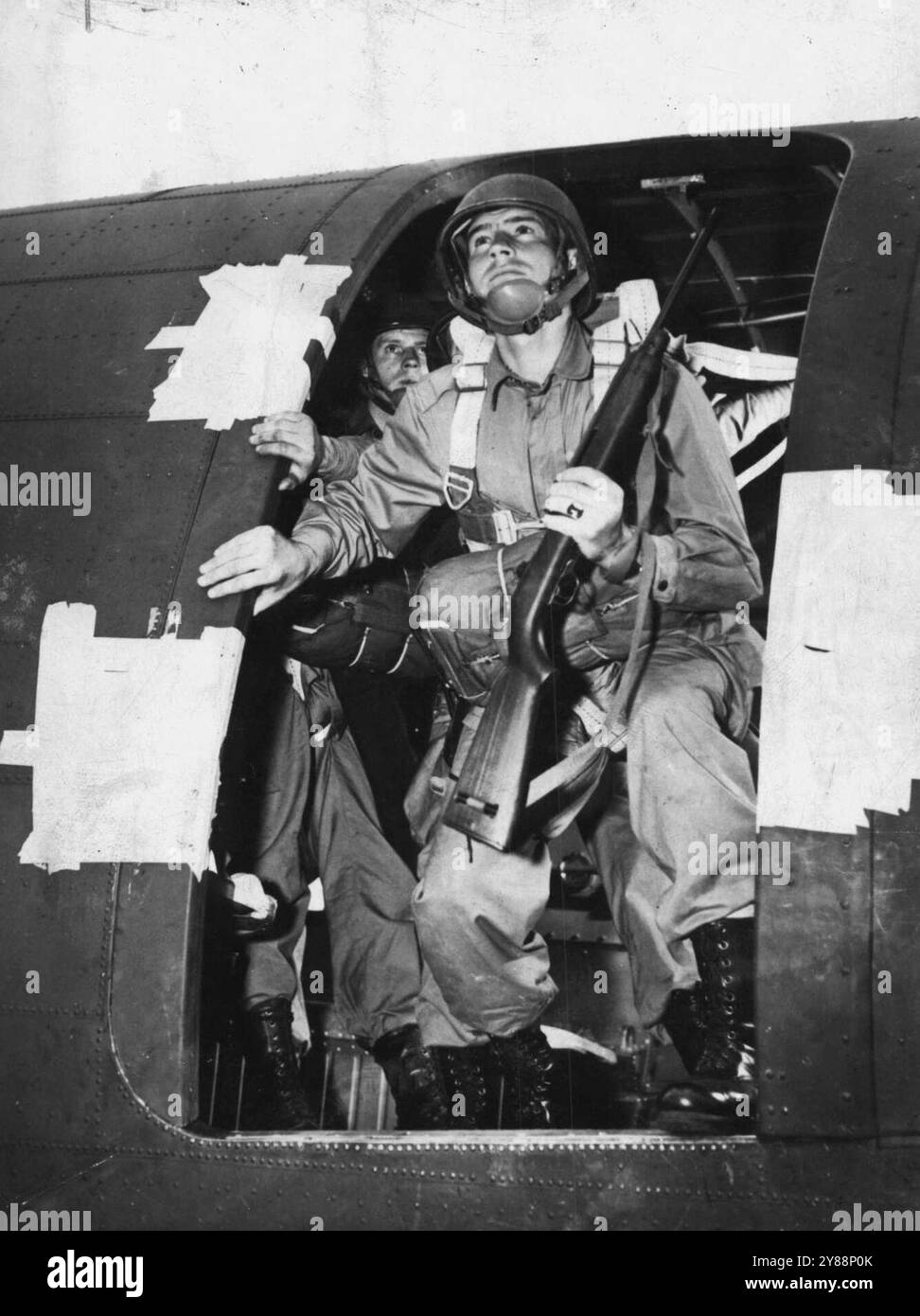 In Mass Training For Combat - Lieut. Bill Howland prepares to ...