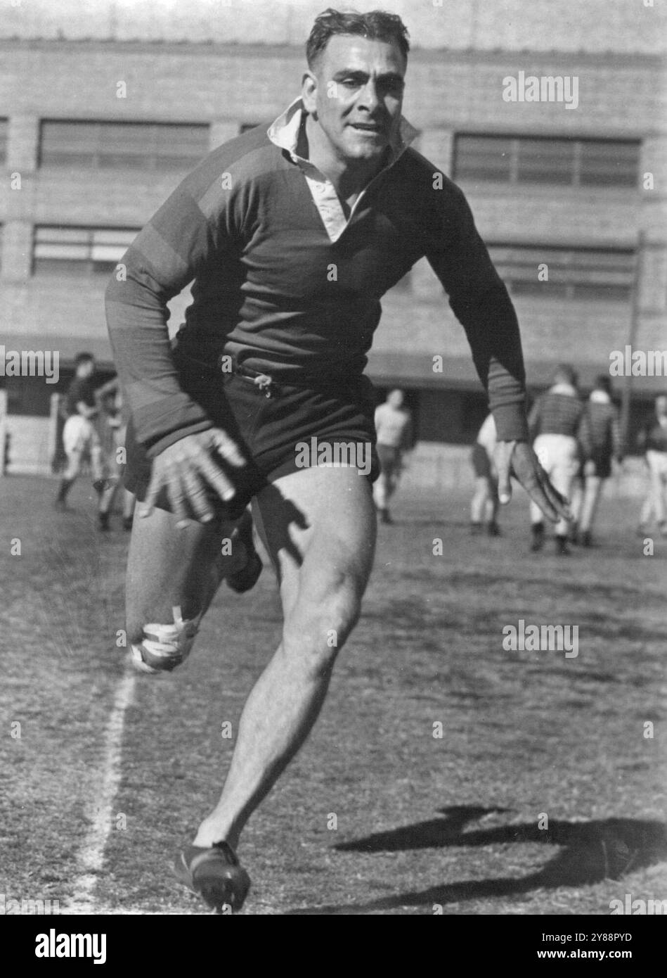 Speedster: Eric Batten, English winger, in spiked shoes, sprints at top ...