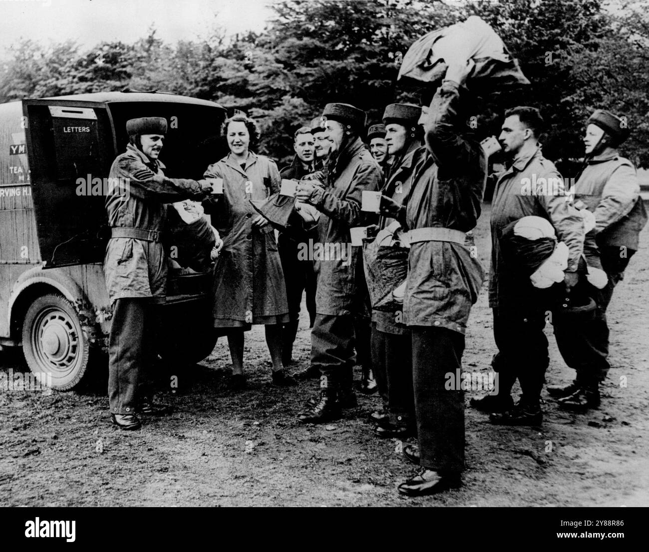 They've Come Down For Tea - Parachutes who have just landed gather ...