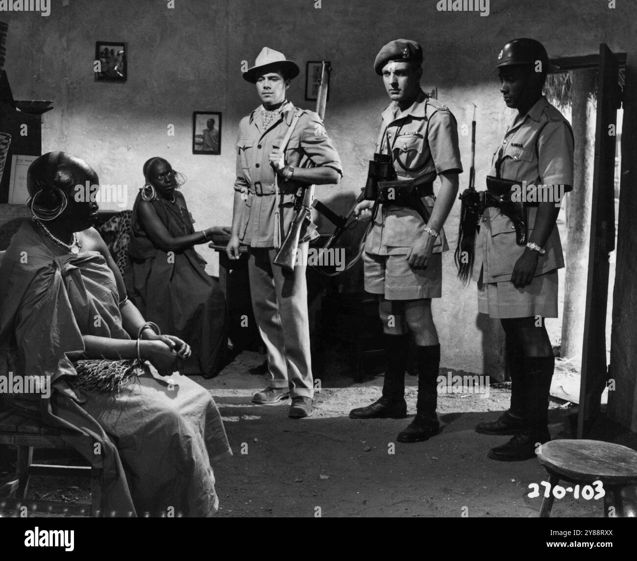 Inspector Drummond (Sinden) and Alan question wives of Mau Mau men in ...
