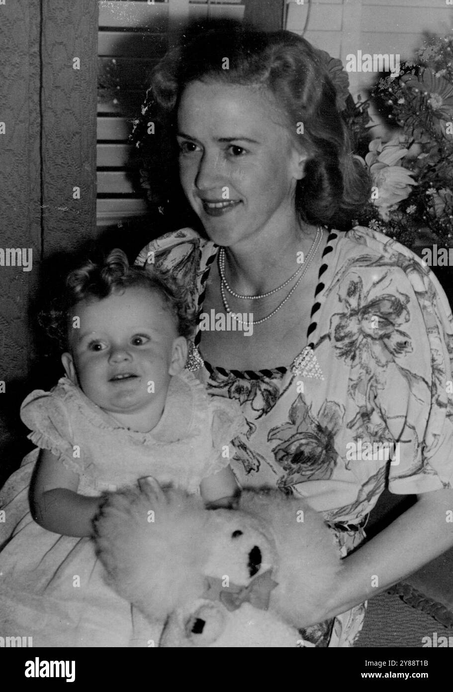 Charming camera study of Mrs. Armstrong, wife of the Minister in Charge ...