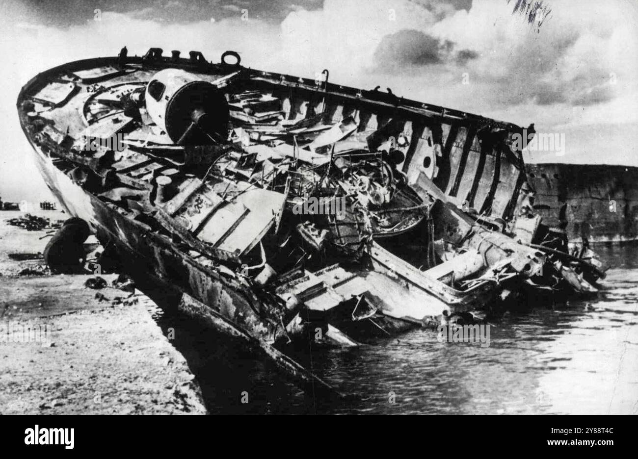 This Axis ship was literally "blown out of the water" in Bengasi harbor ...