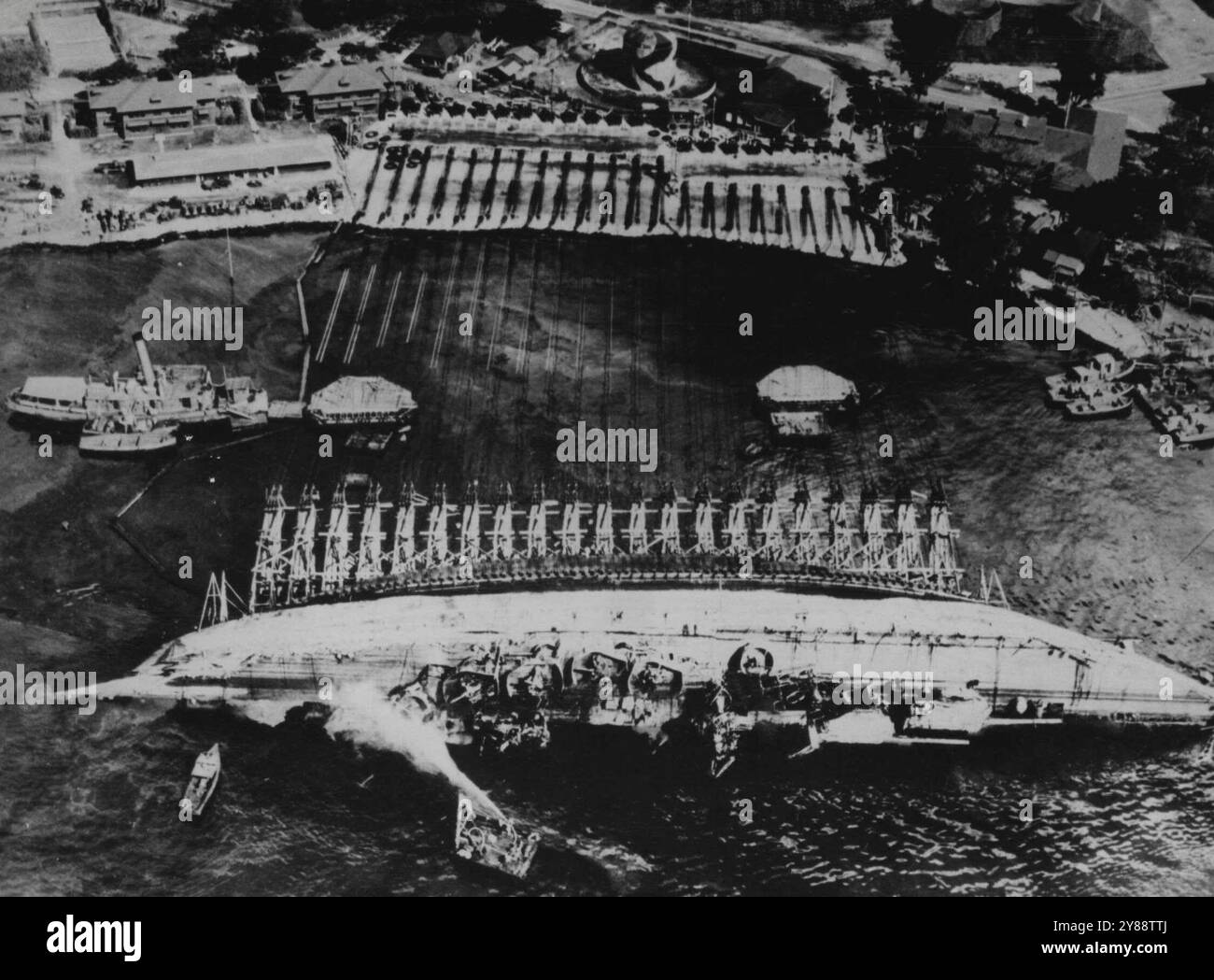 Raising of the USS Oklahoma - With the stricken battleship Oklahoma ...