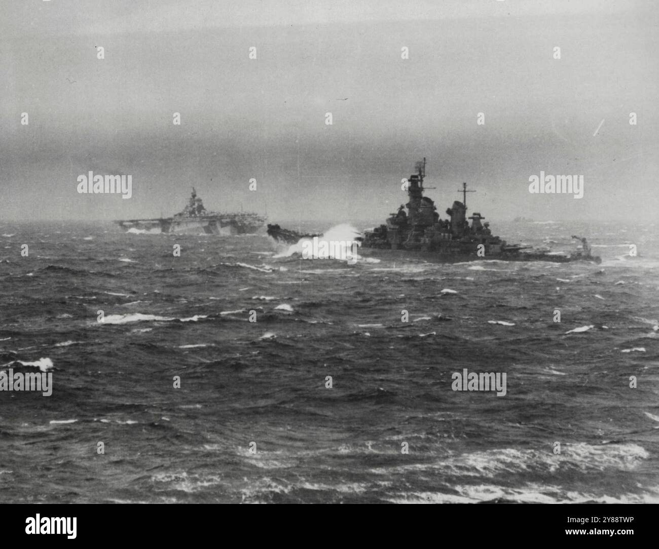 Rough Weather In The Pacific: White foam swirls across the decks of the ...