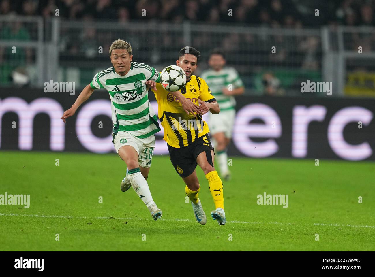 Dortmund, Germany. 1 October, 2024. Yan Couto of Borussia Dortmund battle for the ball during ...