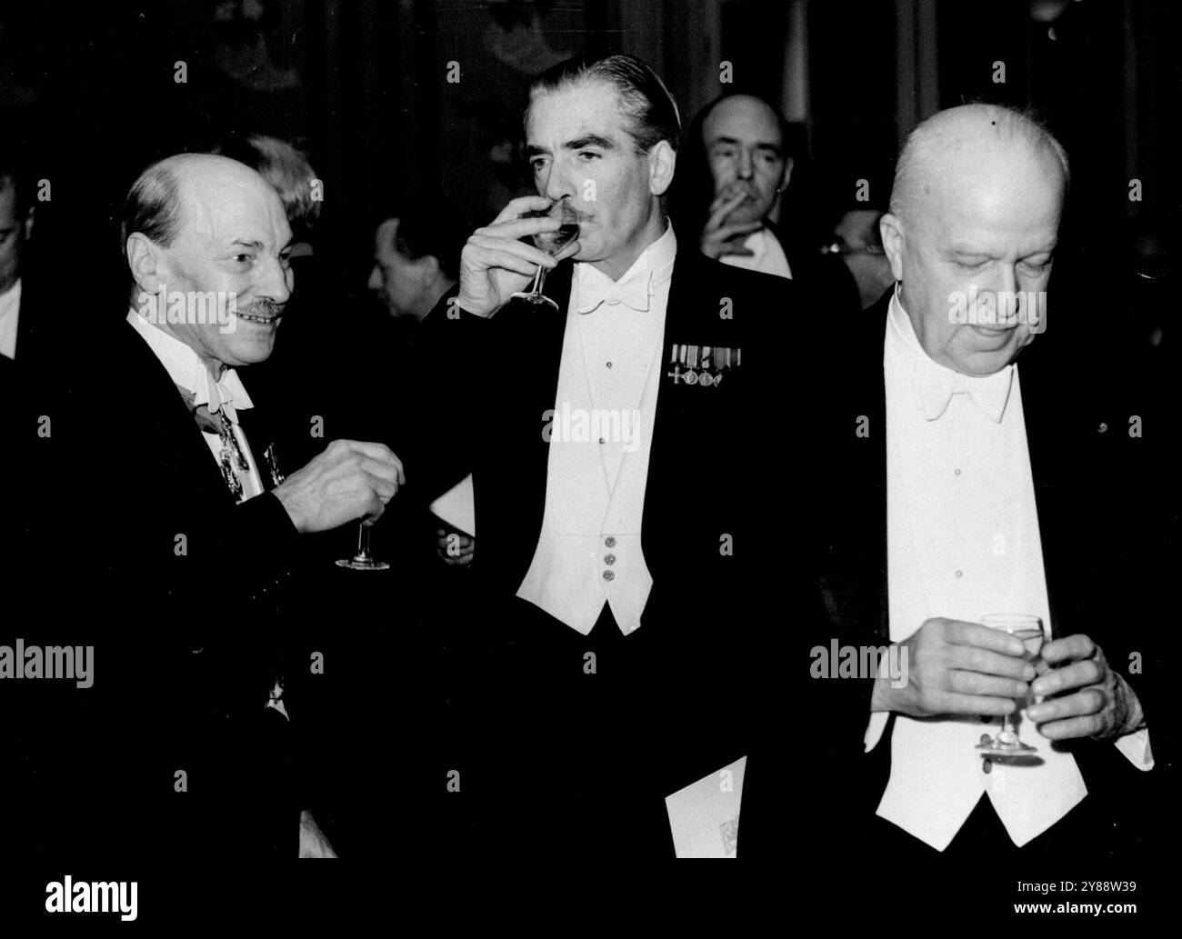 Pilgrims Dinner at the Savoy -- (left to right) Mr. Clement Attlee, Mr ...