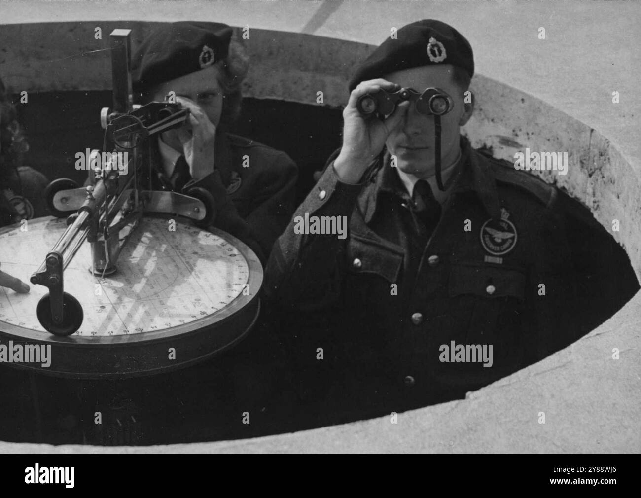 Keeping Watch On The Skies -- Team at an observation post takes a ...