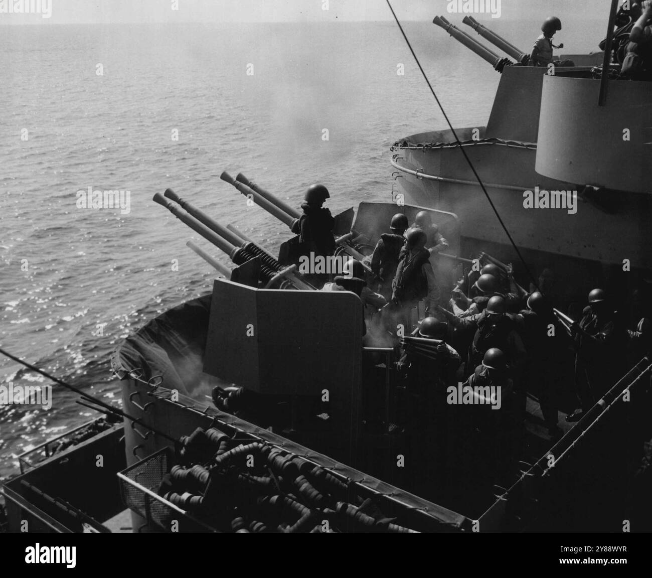 Just Practice - A 40mm gun crew of a quad-40 mount aboard battleship ...