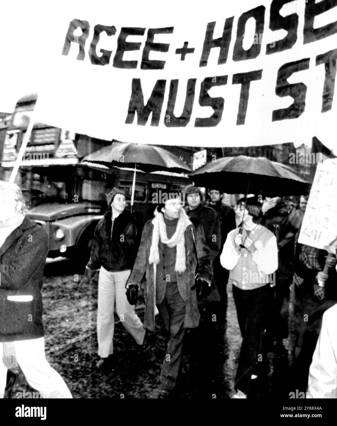 Former CIA agent Philip Agee, center with scarf, at the head of today's ...
