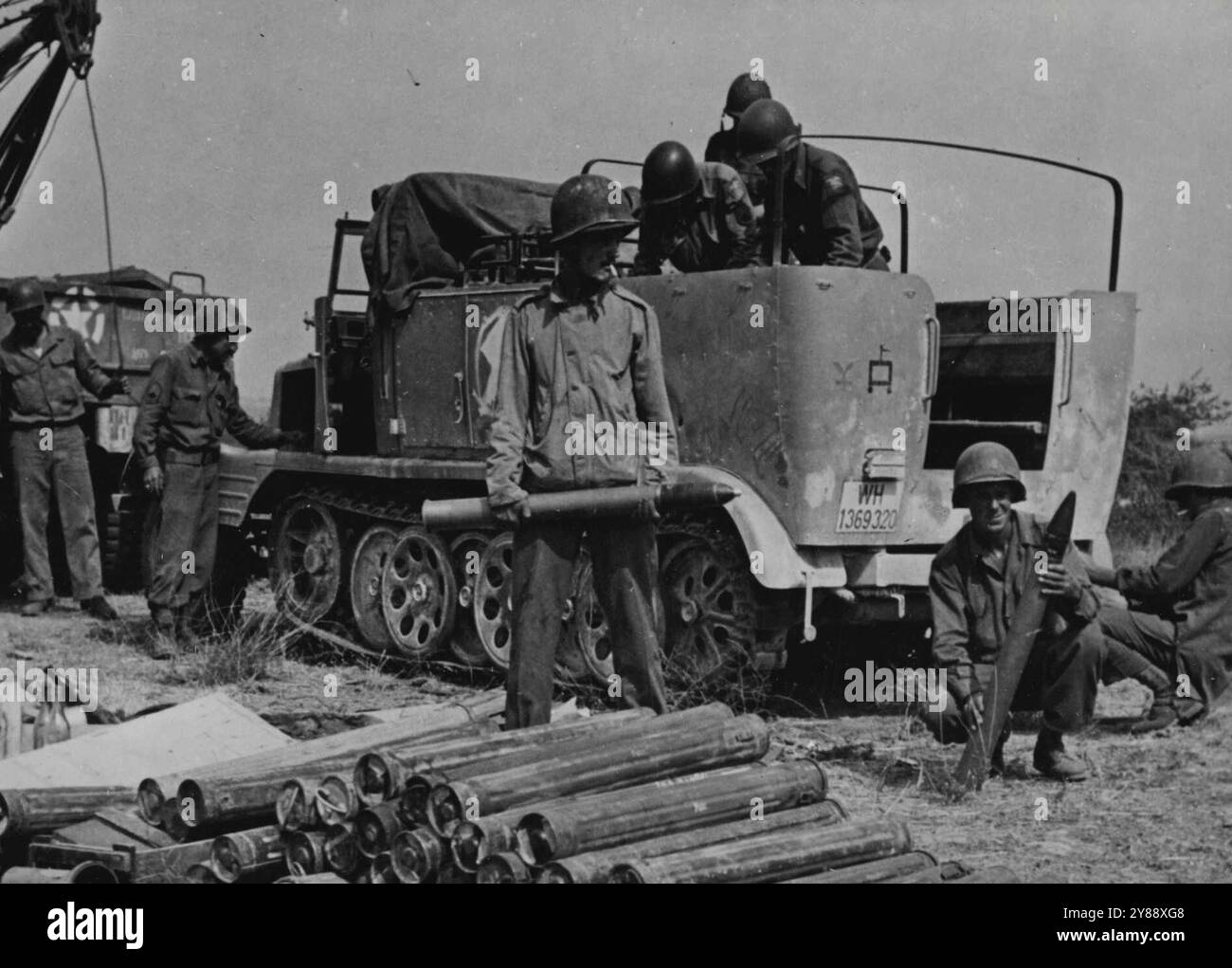 U.S. Forces Capture German Stores -- U.S. Army soldiers hold German ...