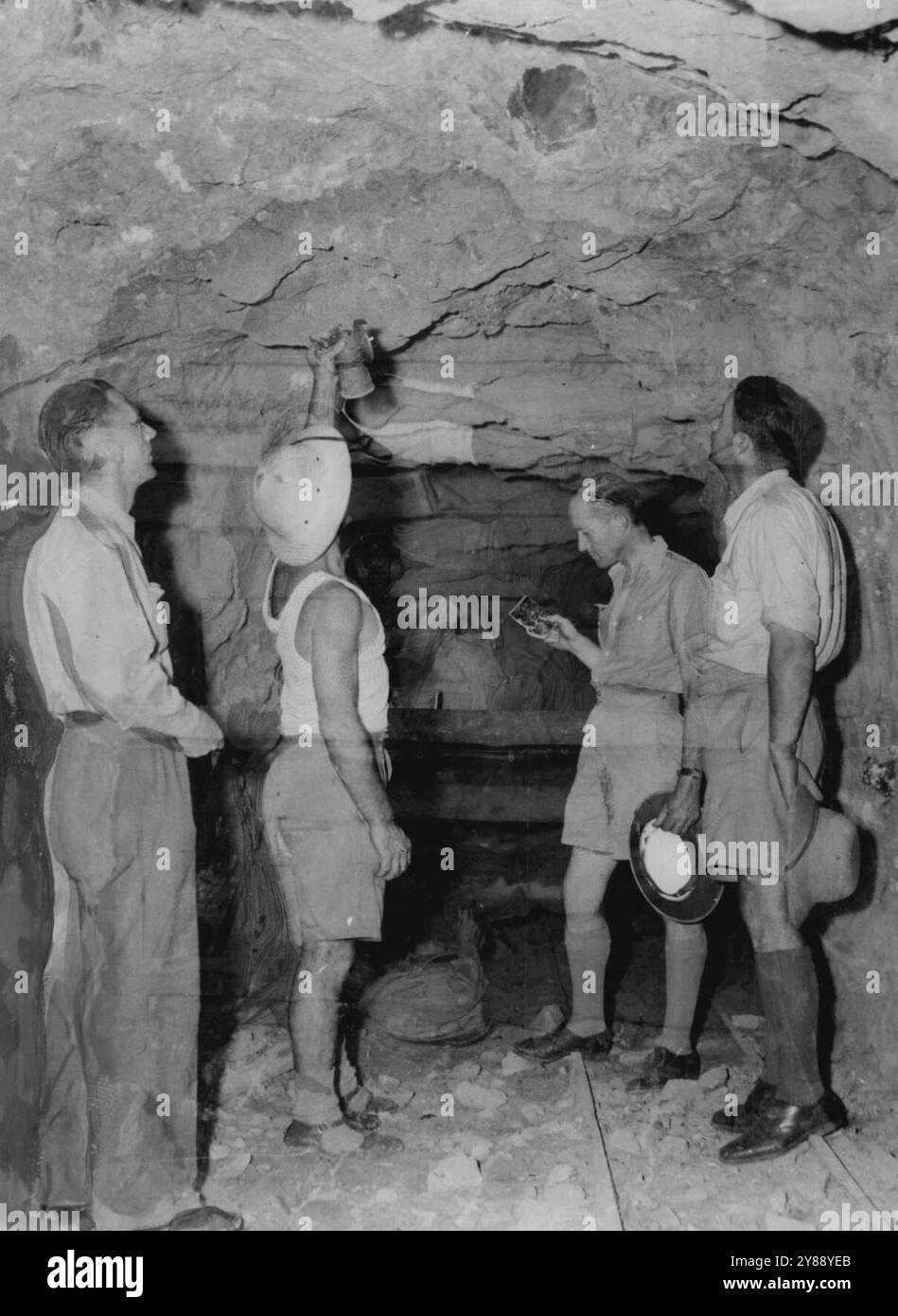 Inspecting the underground work in a drive on one of the ***** Works ...