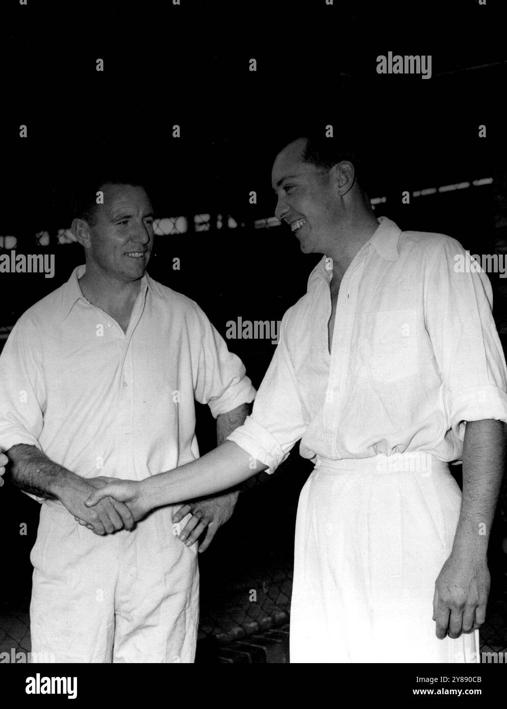 Ken Archer (right) congratulates new state captain Ray Lindwall ...