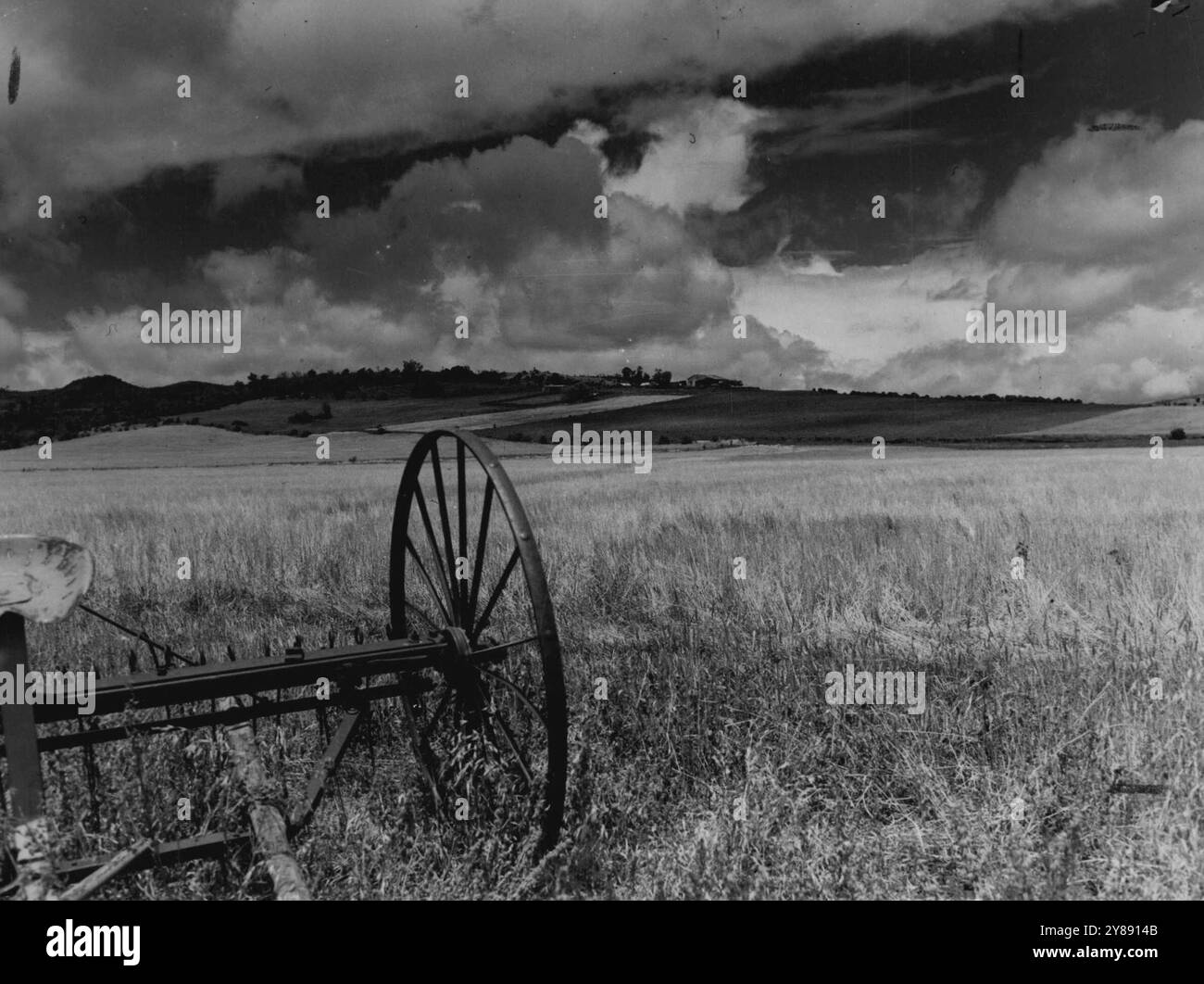 The wheel of a harvest machine sets off this farm scene in the Yangan ...