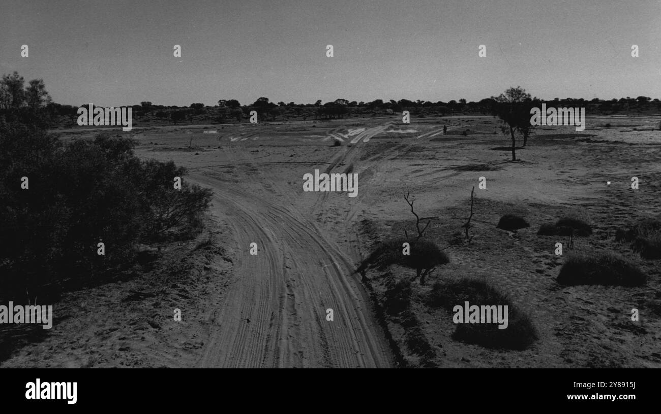 A typical claypan on Innamincka track after light rain. All tracks may ...