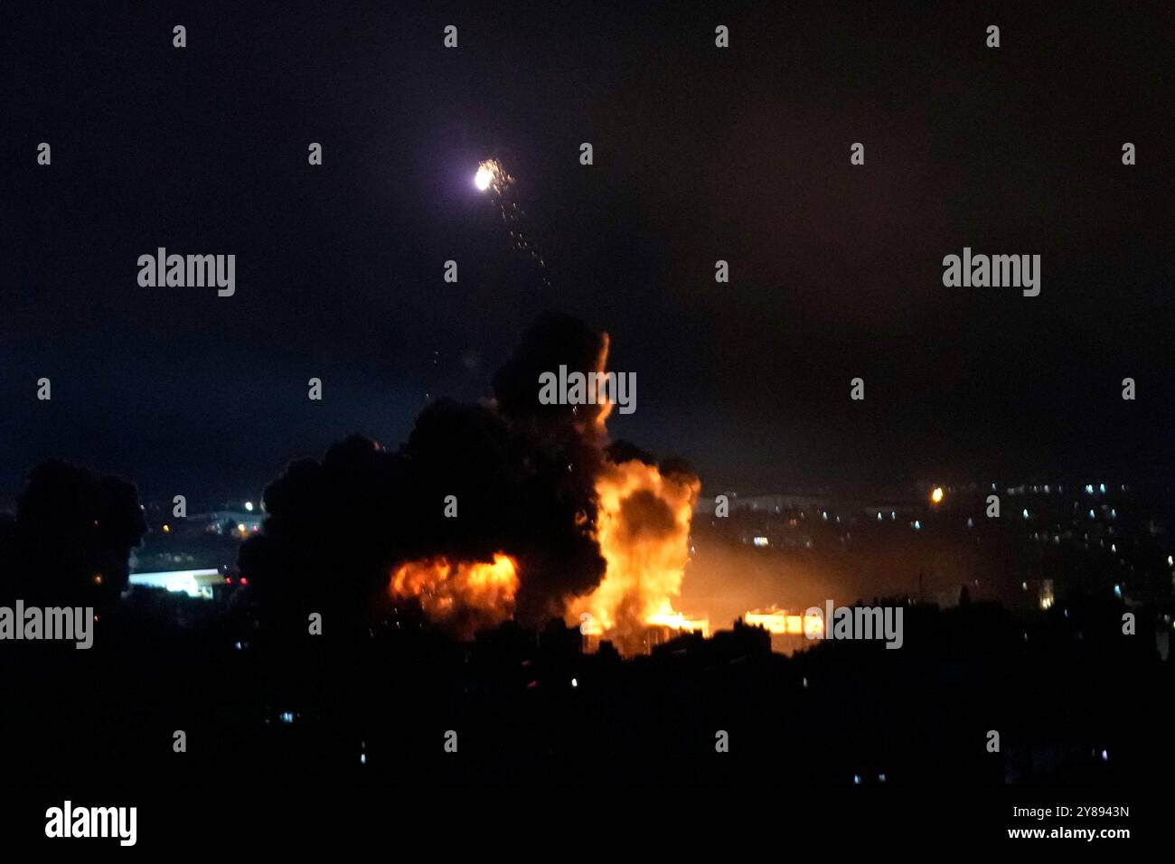 Flames rise from Israeli airstrikes in Dahiyeh, Beirut, Lebanon, Friday ...