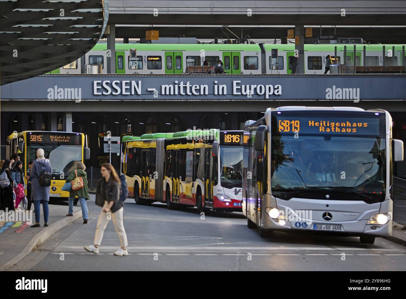 Essen public transport buses at Essen central station with local train ...