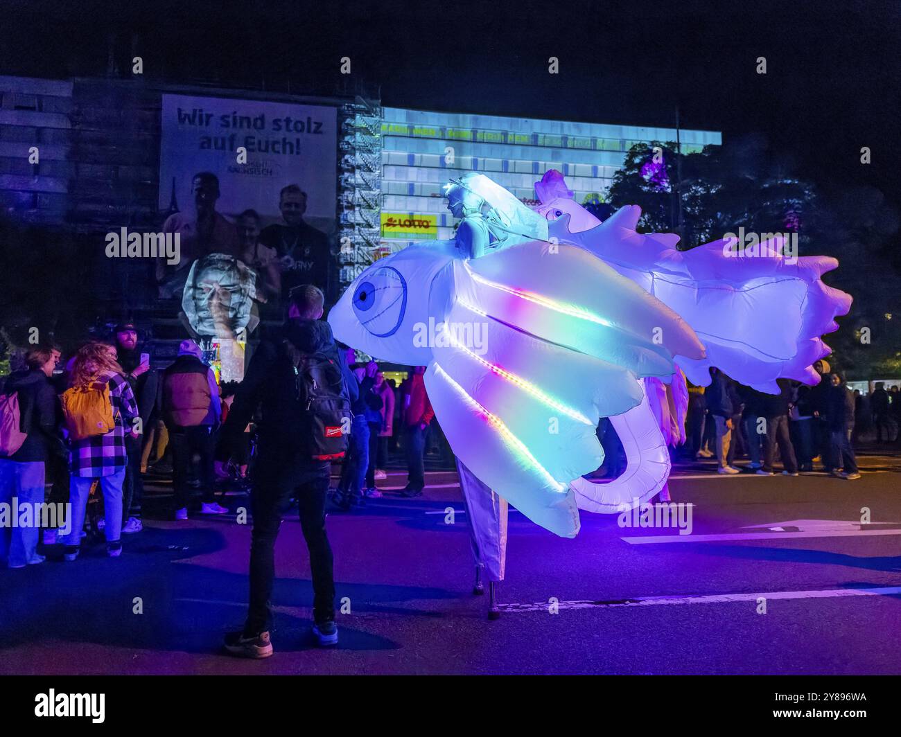 Walking act, underwater, stilt artists float gracefully across the ...